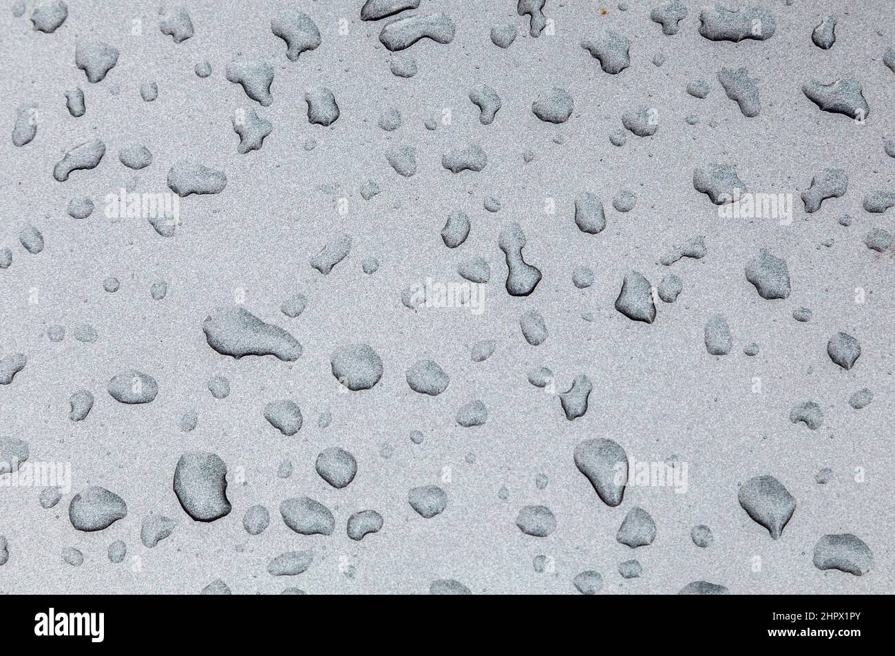 pattern of rain drops on a metal background of a car Stock Photo - Alamy
