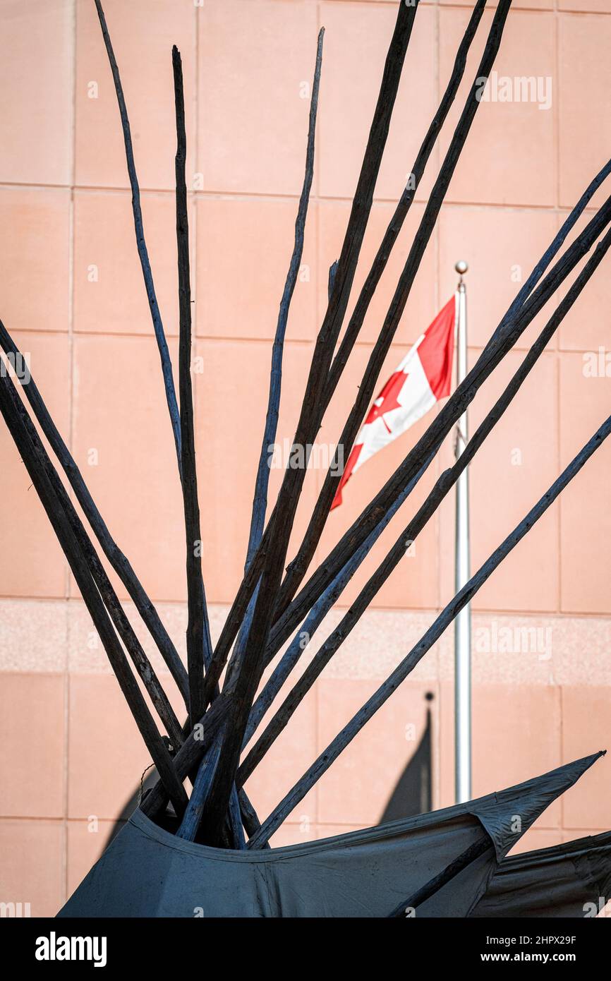 First Nations teepee with the Canadian flag in the background Stock ...
