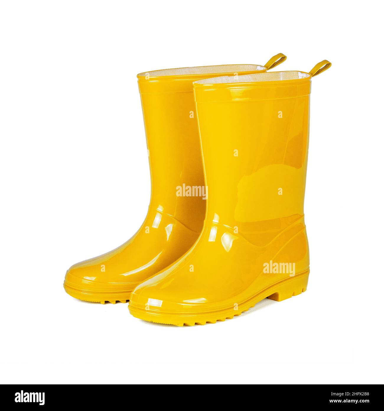 Yellow rubber boots isolated on white background Stock Photo - Alamy