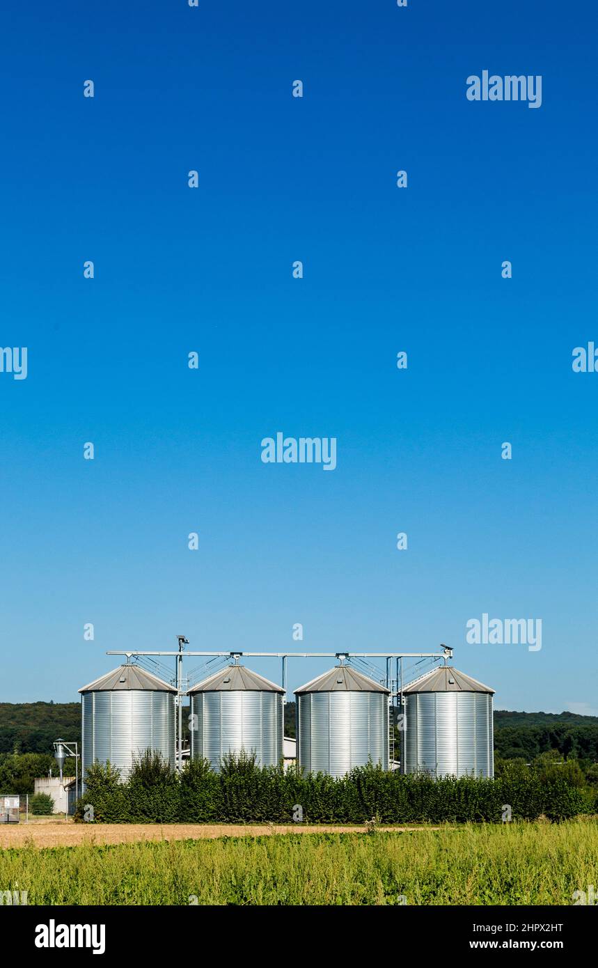 Four silver silos in hi-res stock photography and images - Alamy
