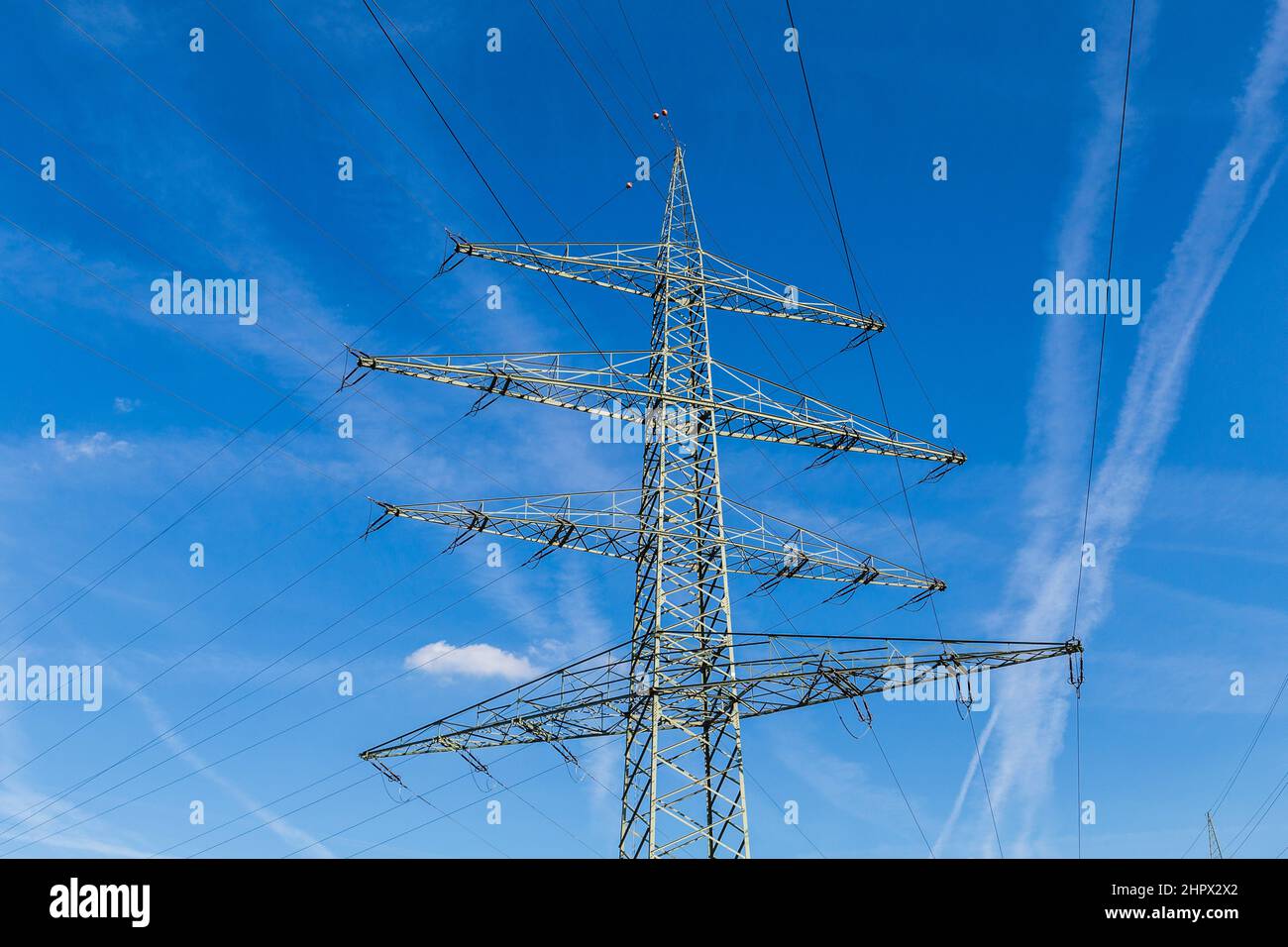 Impressive electric pylons transporting electricity through high ...