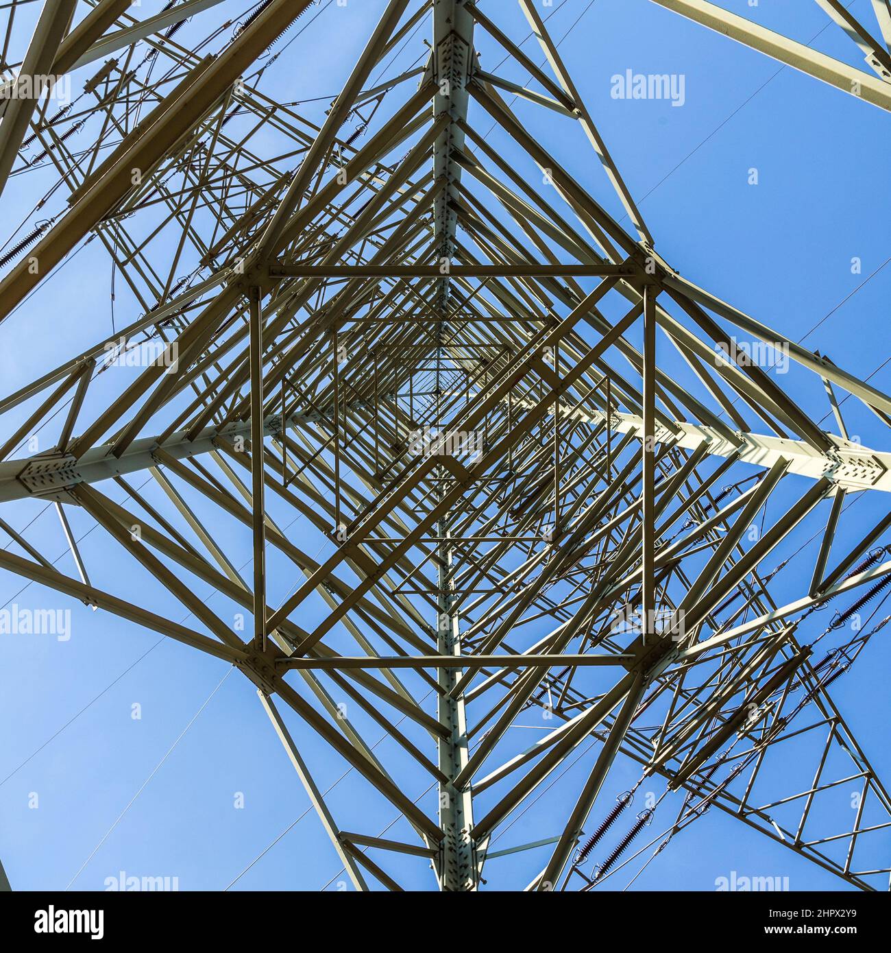 Impressive electric pylons transporting electricity through high ...