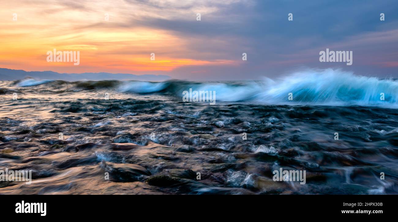 Ocean Landscape With A Detailed Foreground Of A Wave Breaking Towards ...