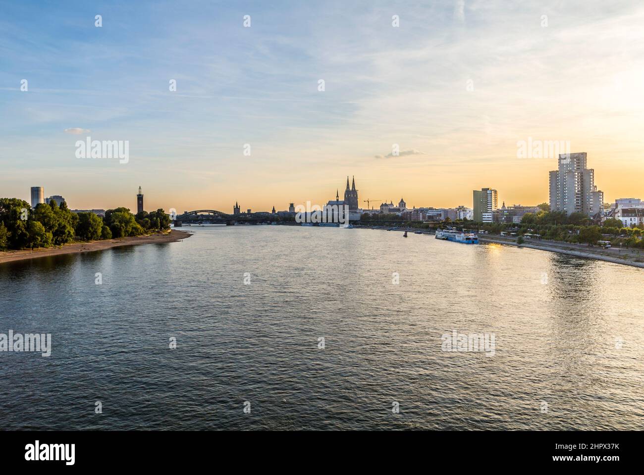 skyline of Cologne with river Rhine in late afternoon Stock Photo - Alamy