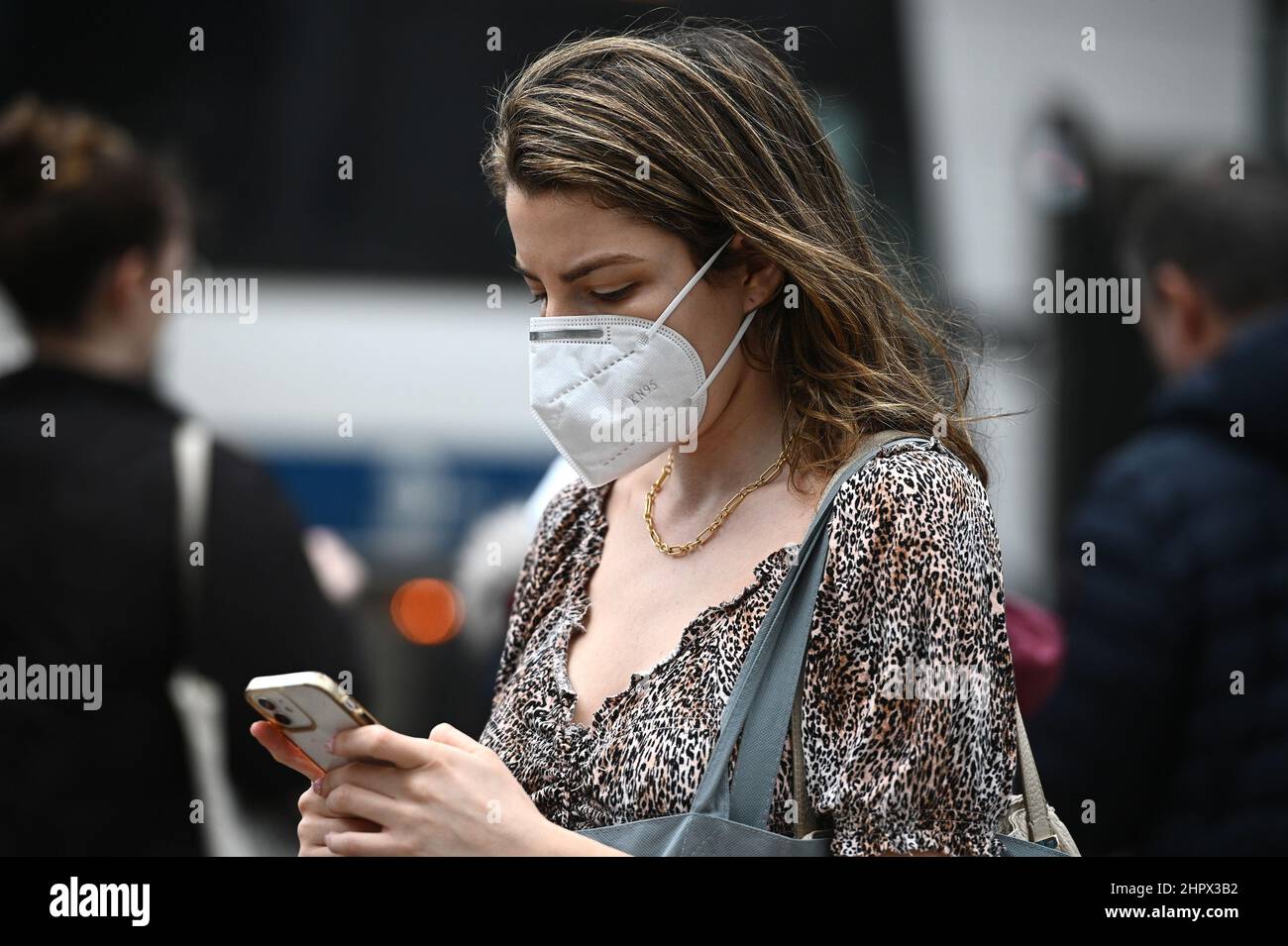 New York, USA. 23rd Feb, 2022. A woman walking through Herald Square ...
