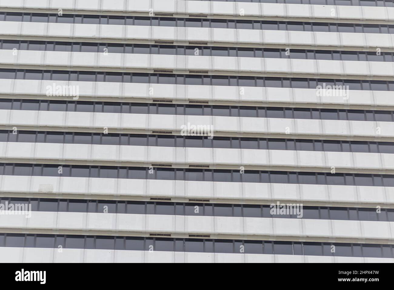 Windows of office building for background Stock Photo - Alamy