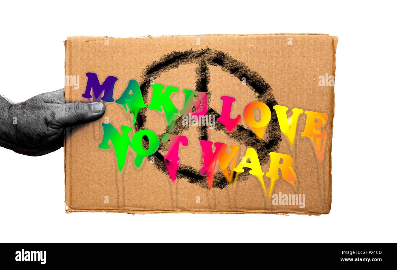 A Cardboard poster with a pacifist legend on a white background. Hand ...