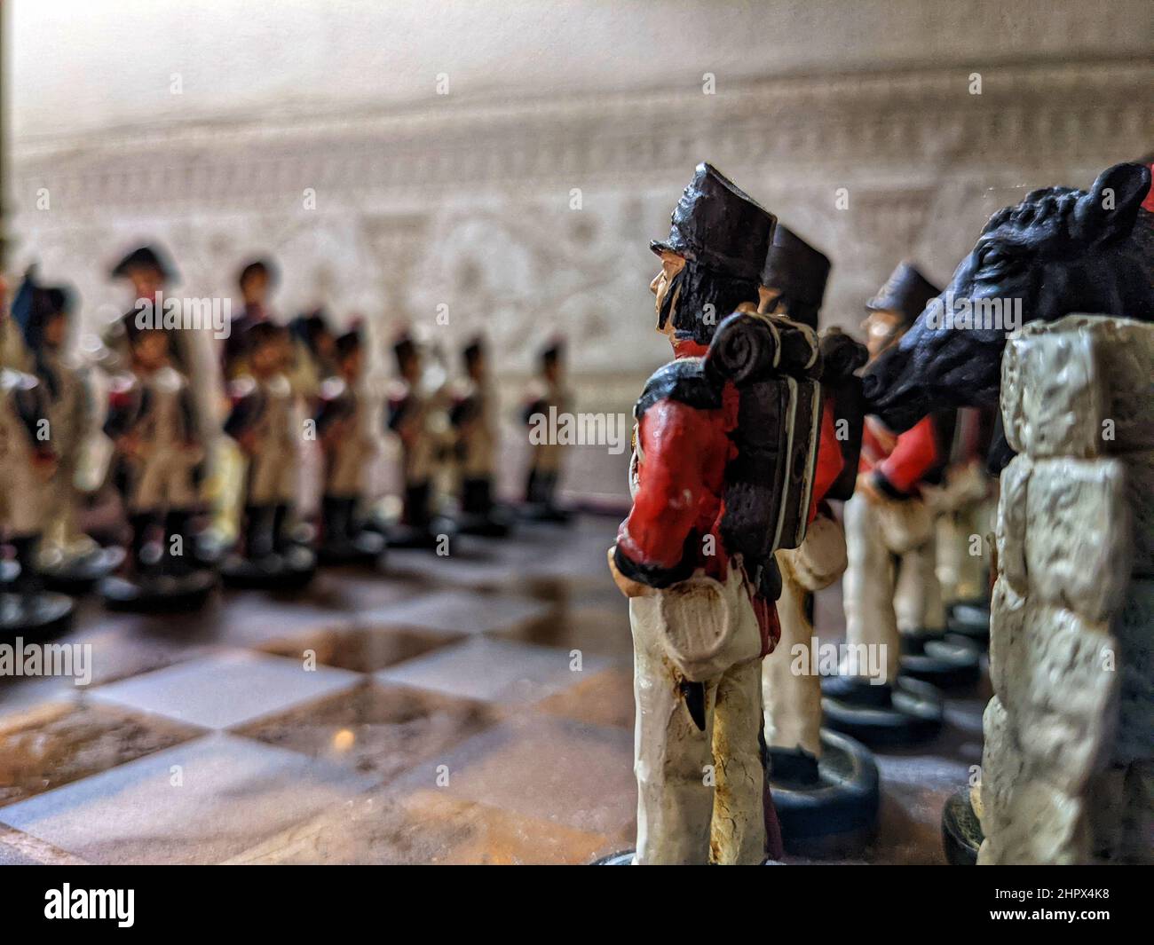 Closeup shot of small soldier figures on a chess board Stock Photo - Alamy