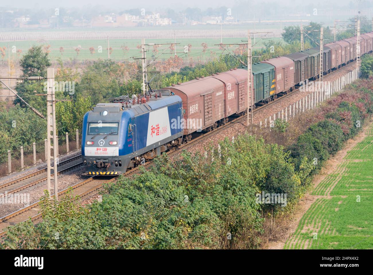 HENAN, CHINA - China Railways HXD3 electric locomotive in Luoyang ...