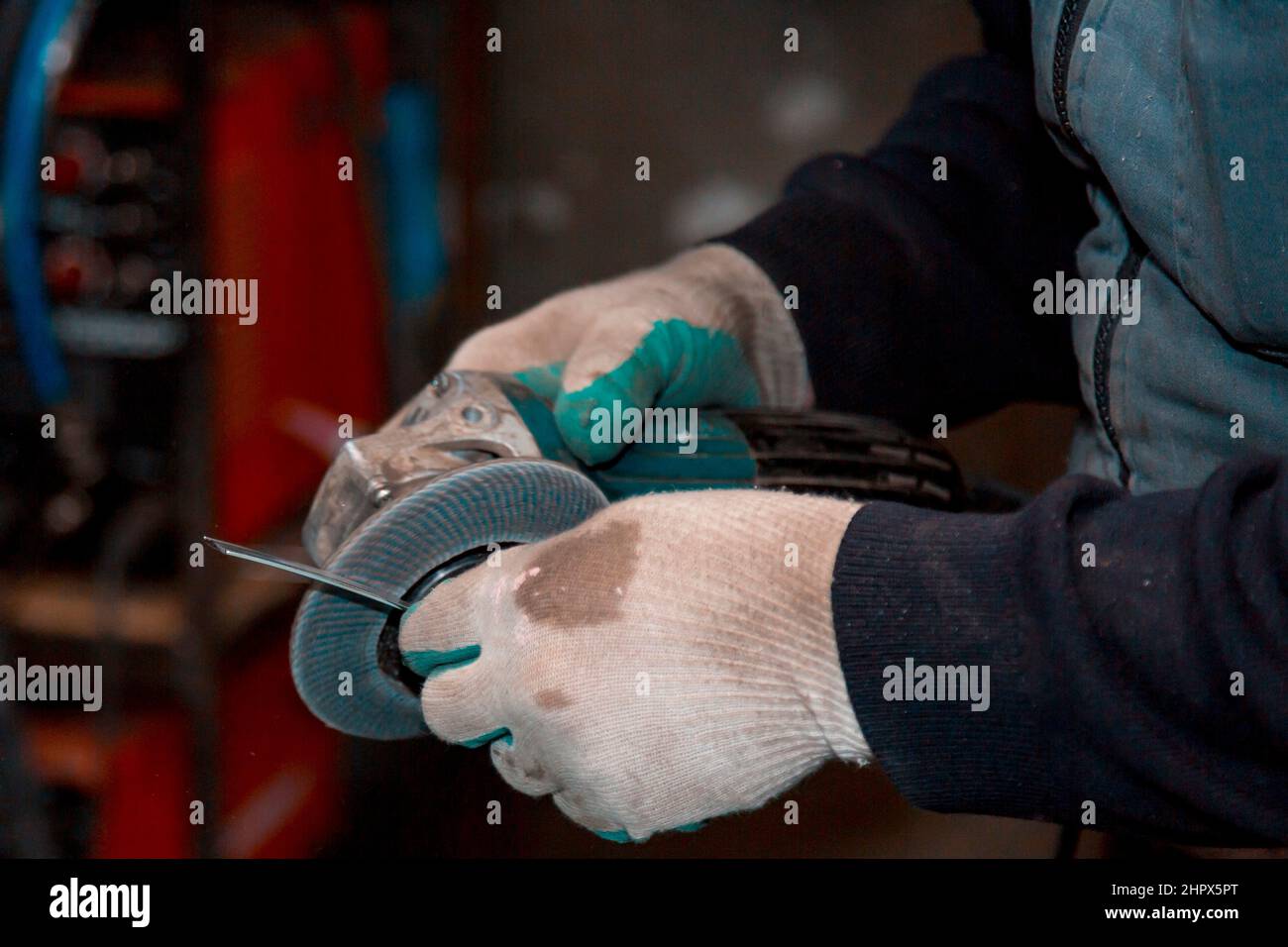Worker using grinder processes hi-res stock photography and images - Alamy