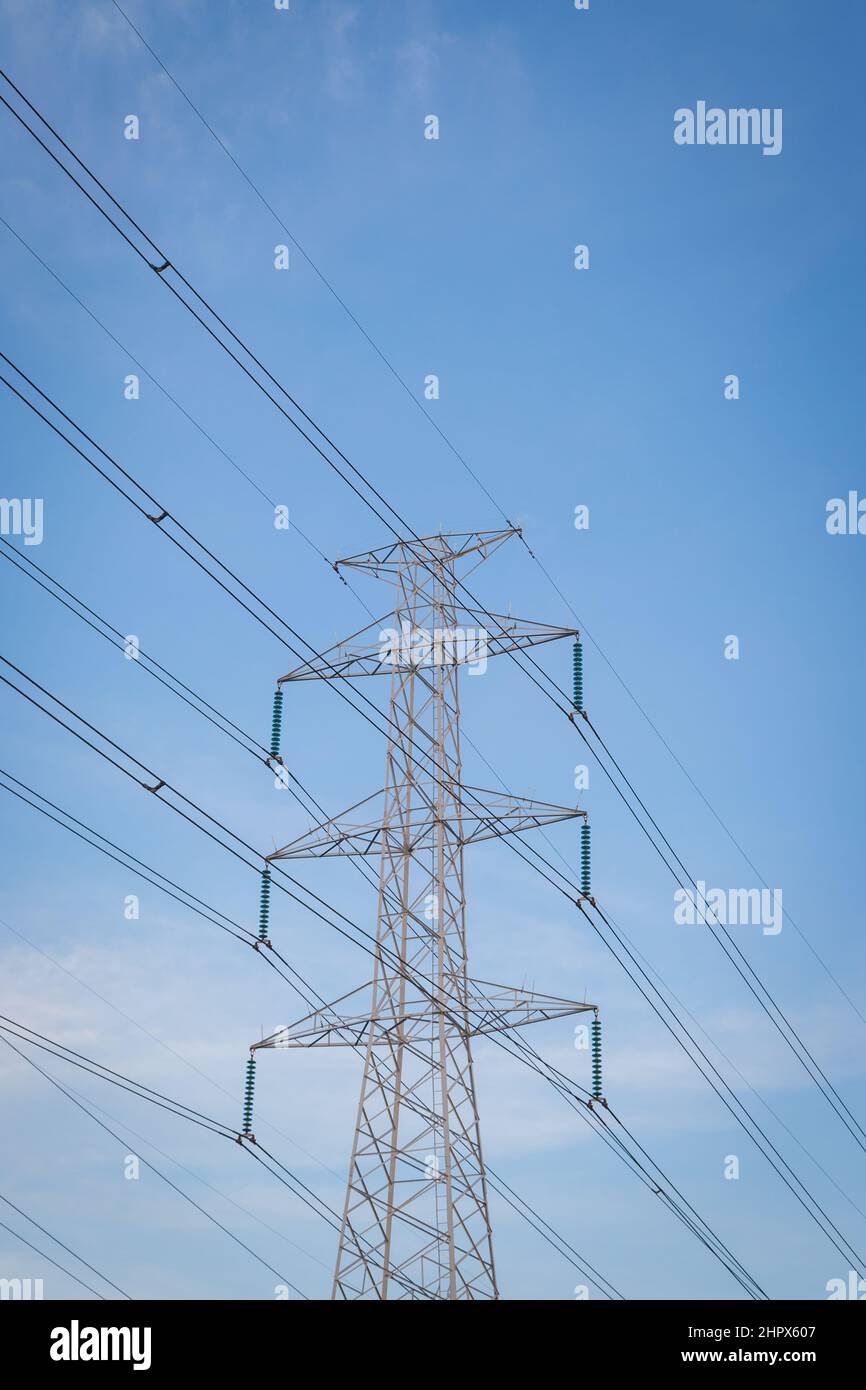 High voltage post tower with blue sky before sunset background Stock ...