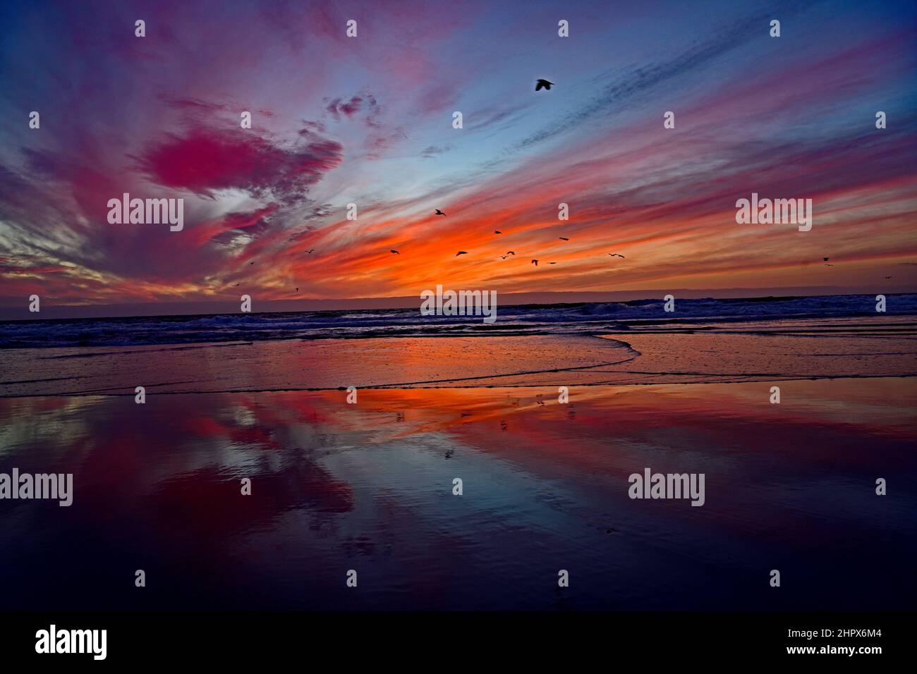 Spectacular Sunset Light at Moss Landing Beach Stock Photo - Alamy