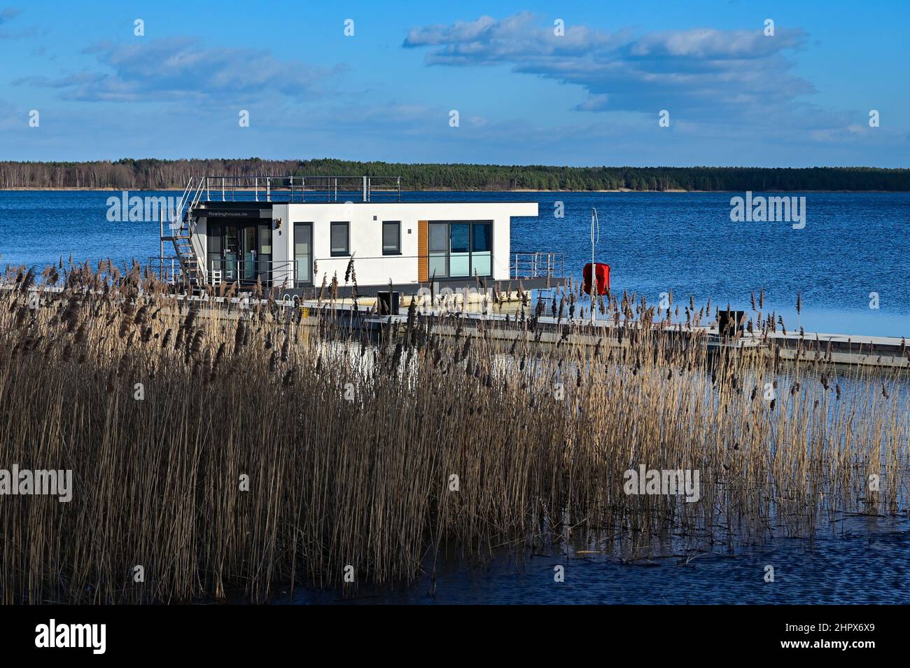 Laasow, Germany. 23rd Feb, 2022. A floating vacation home can be seen ...