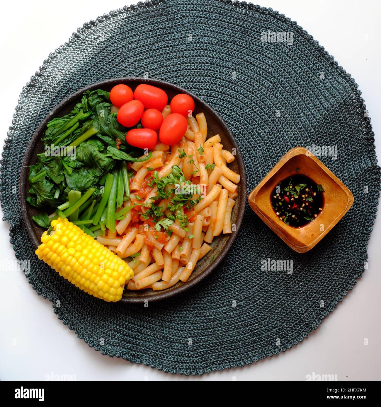 Top view simple vegan food for lunch, plate pasta fried with leaf ...