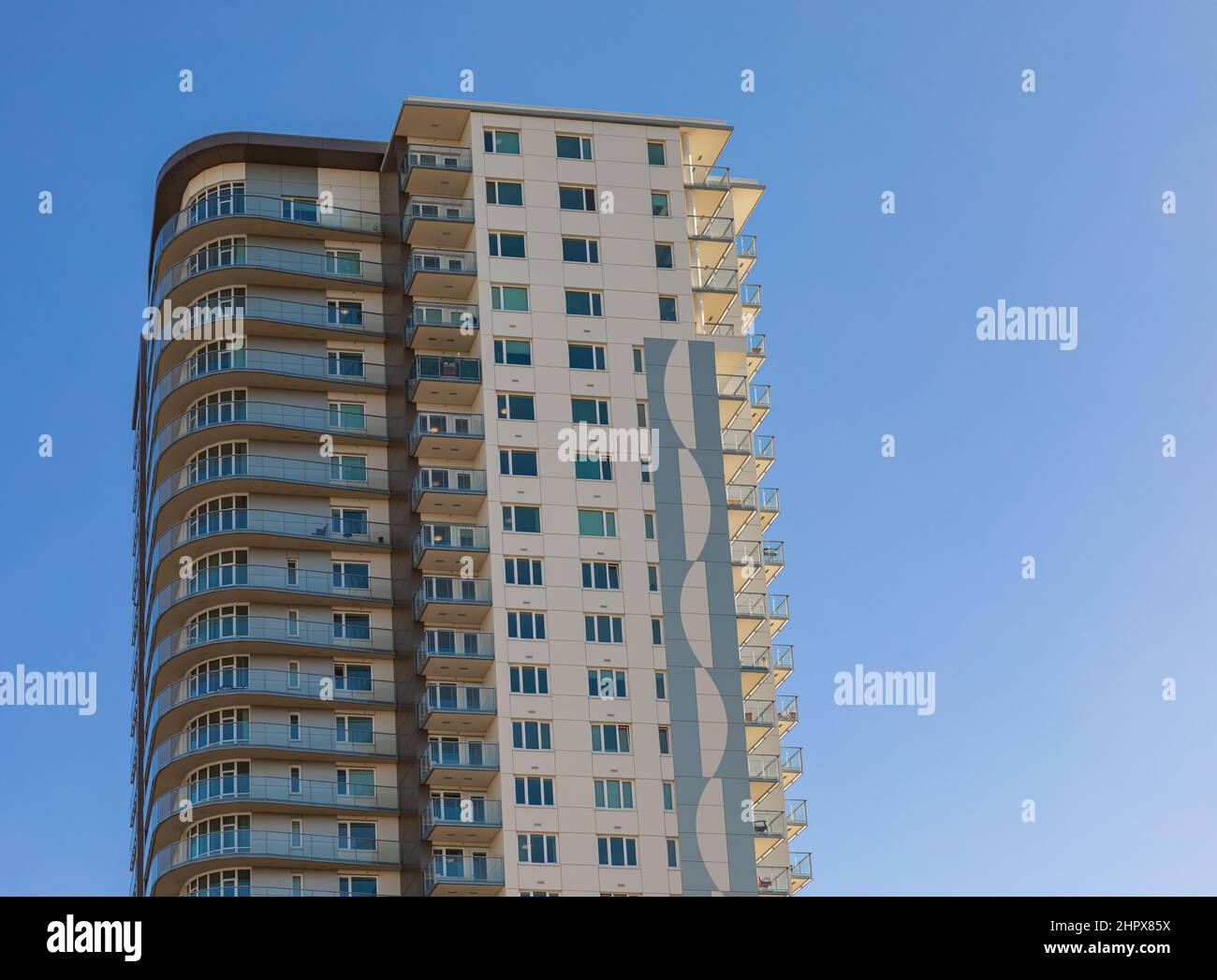 Facade detail of a modern high-rise apartment building. Abstract ...