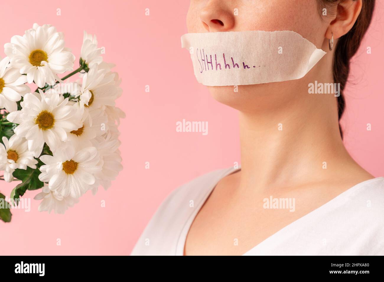 Women taped mouth hi-res stock photography and images - Alamy