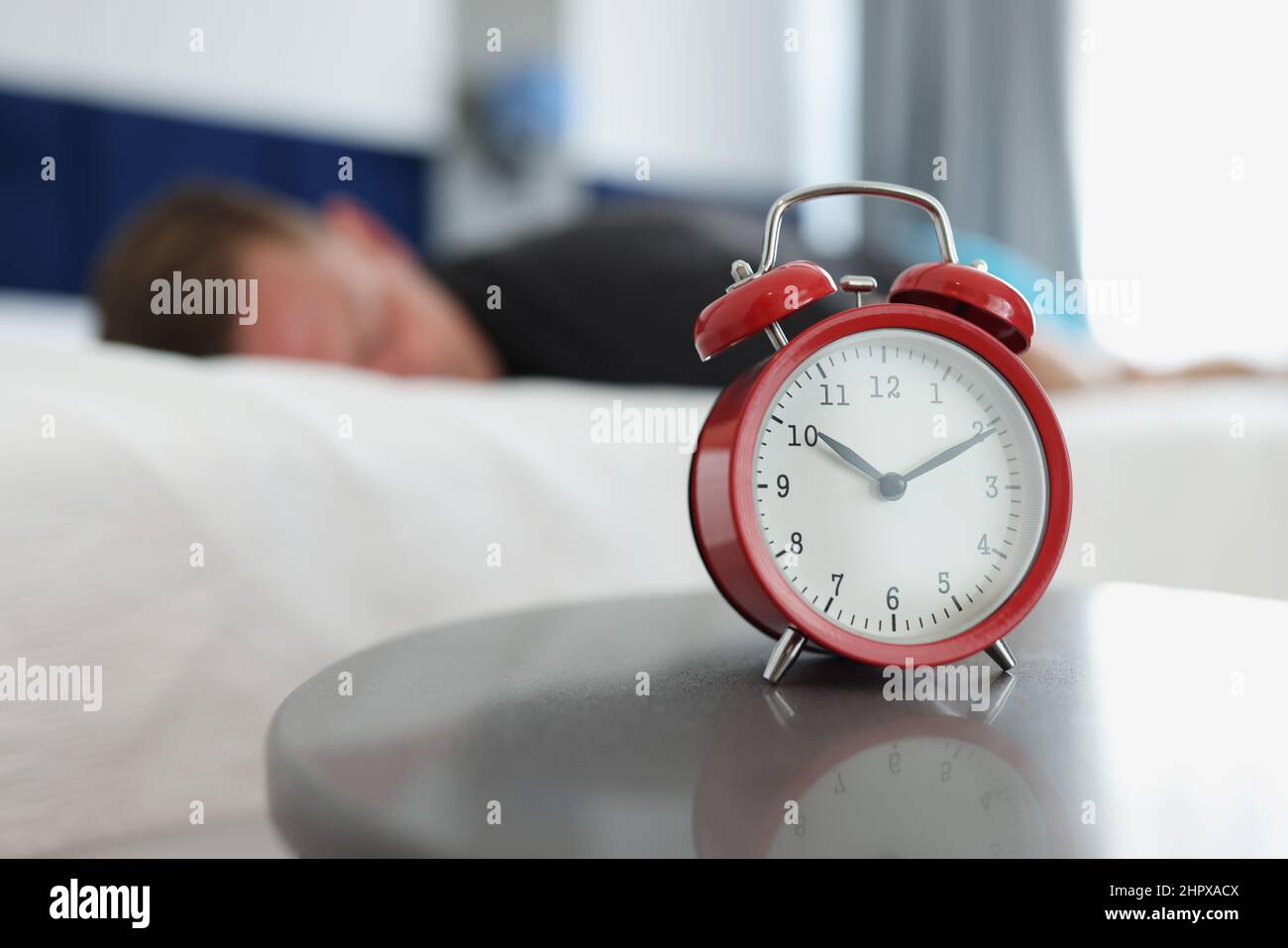 Red man alarm clock hi-res stock photography and images - Alamy