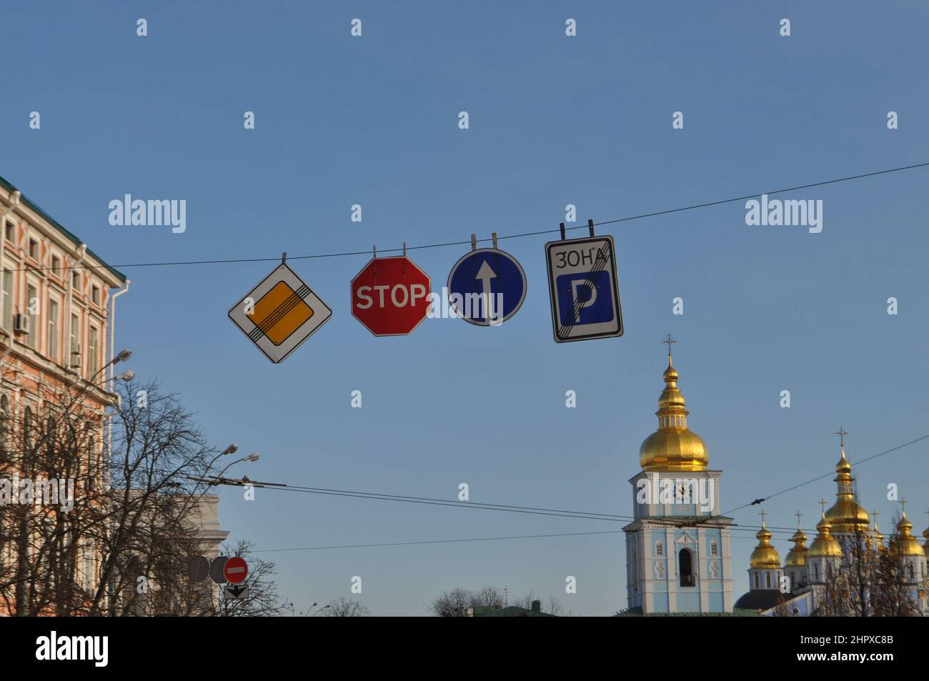 Modern traffic signs in one of Kyiv's central squares with St Michael's ...