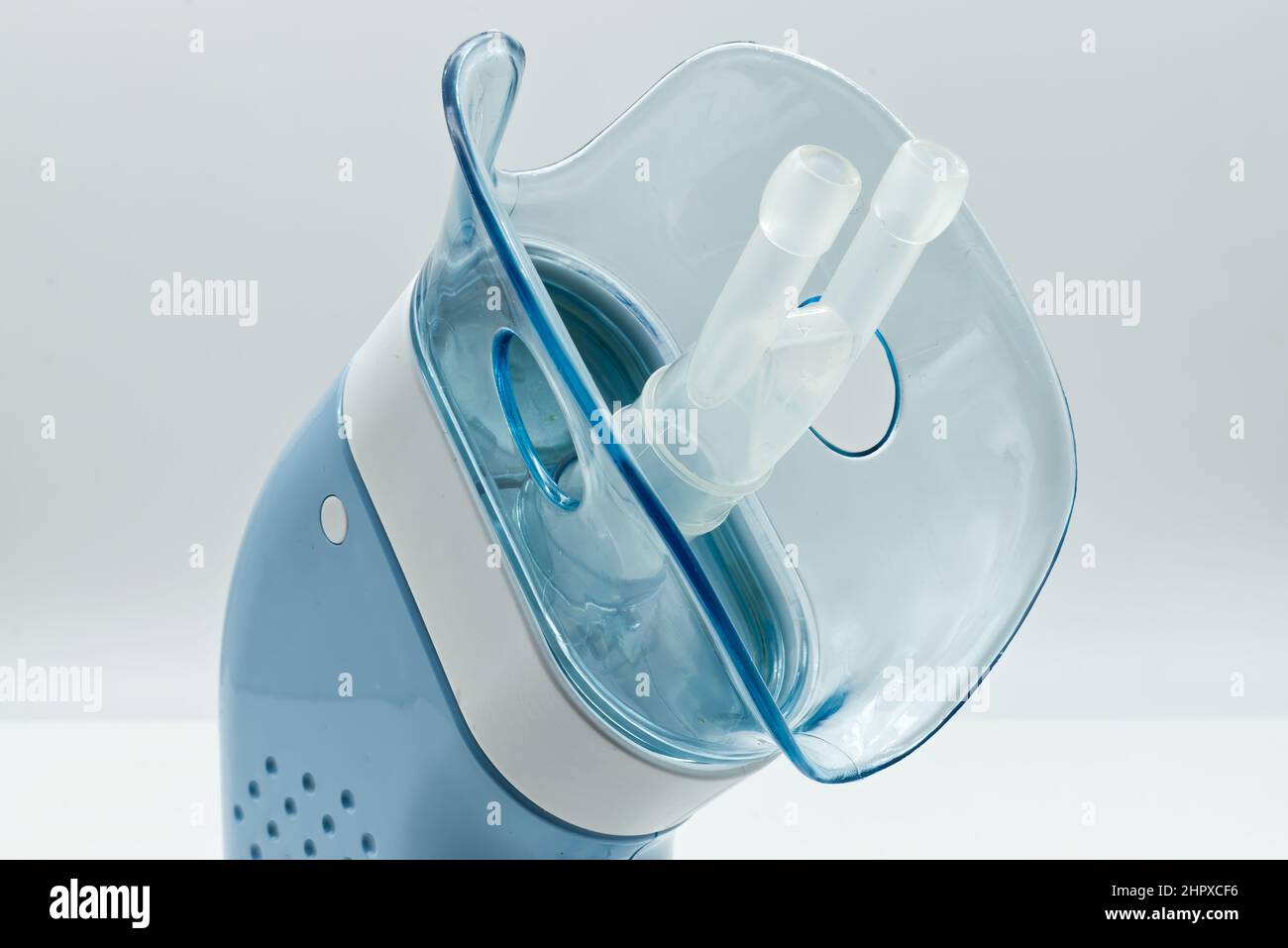 Portable compressor nebulizer with inhaler tool. Close-up. Medical ...