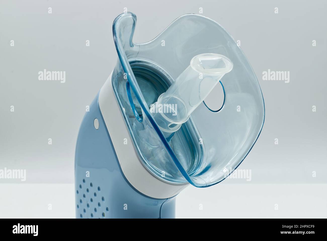 Portable compressor nebulizer with inhaler tool. Close-up. Medical ...