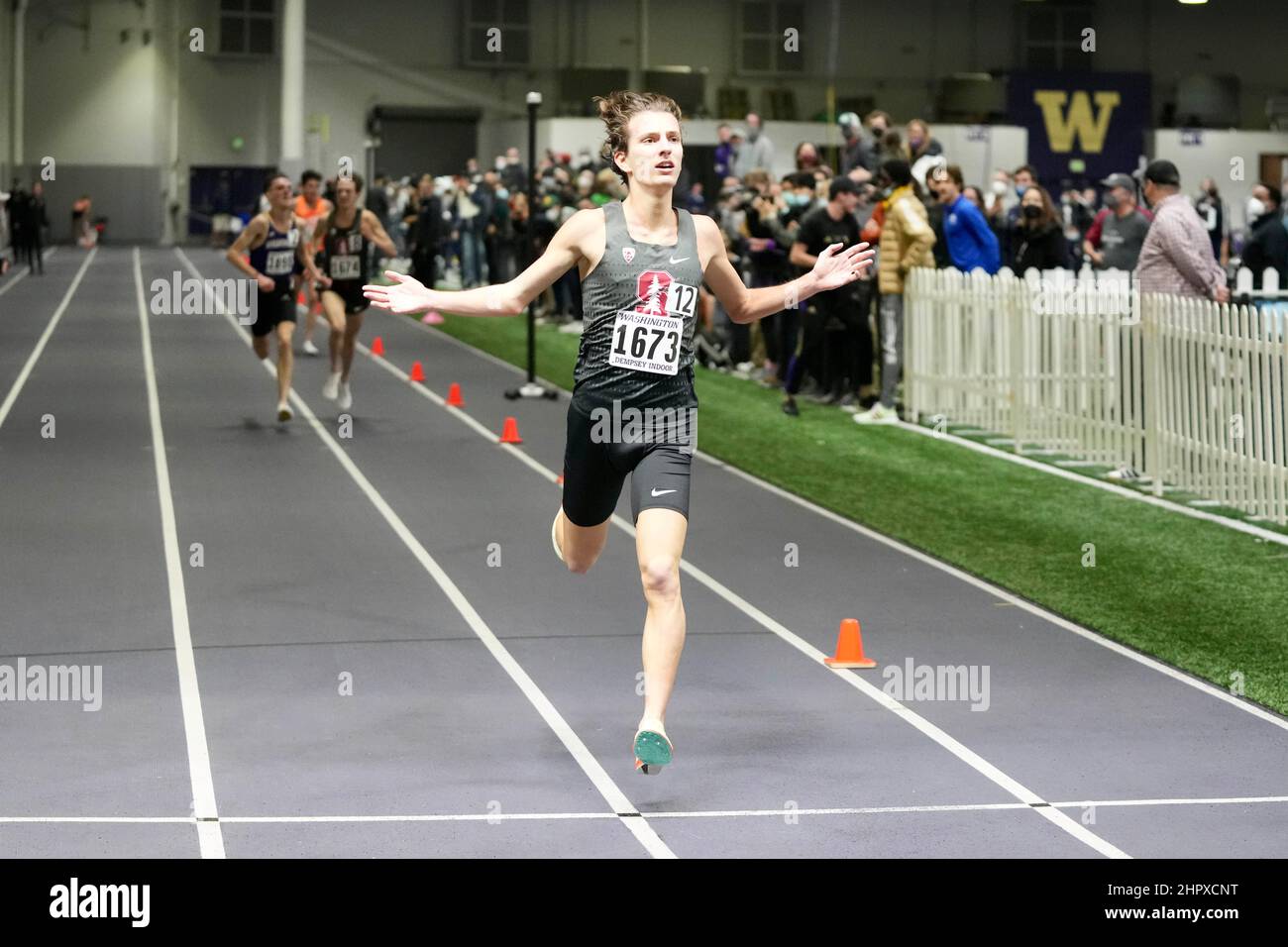 Ky Robinson of Stanford wins the 5,000m in 13:21.85 during the Husky ...