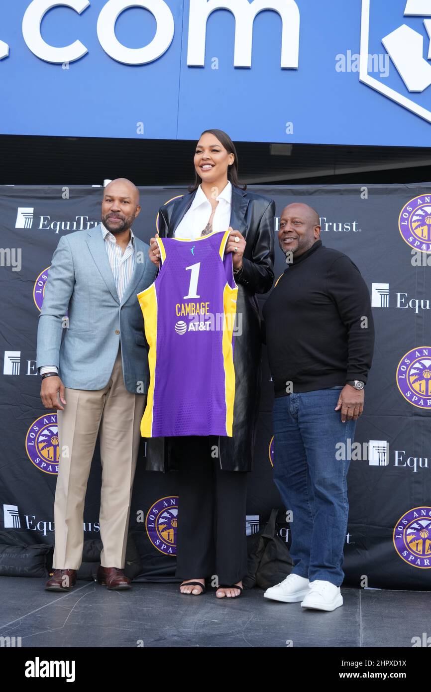 Liz Cambage (center) poses with Los Angeles Sparks general manager ...