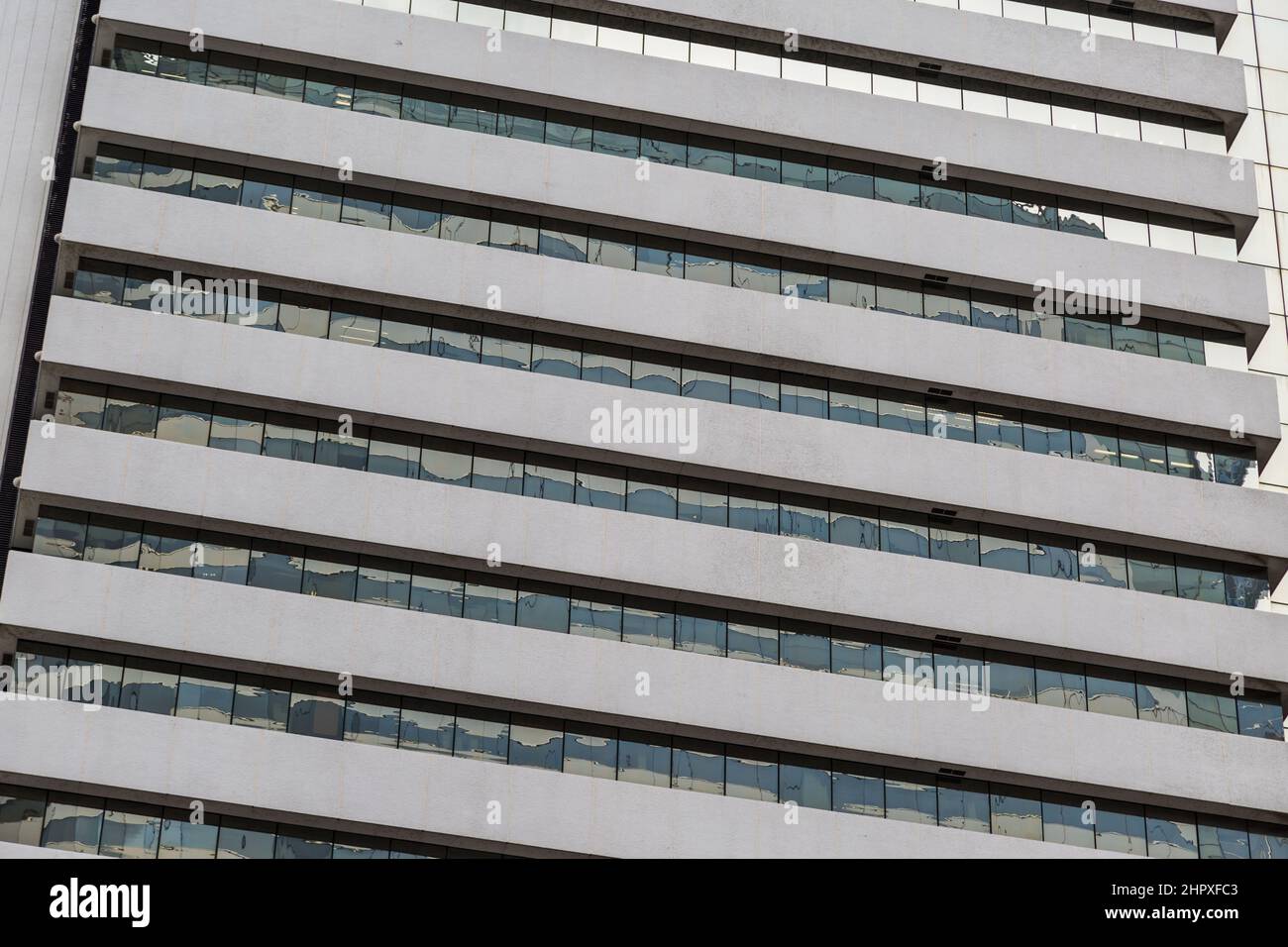 Blue glass office building background Stock Photo - Alamy