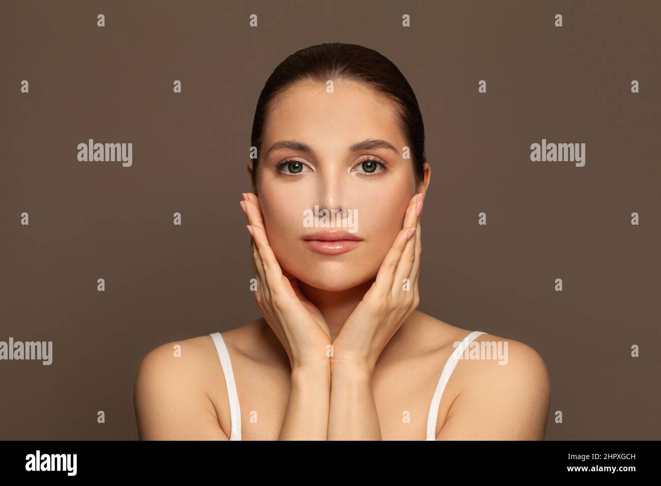 Perfect woman spa model on brown background Stock Photo - Alamy