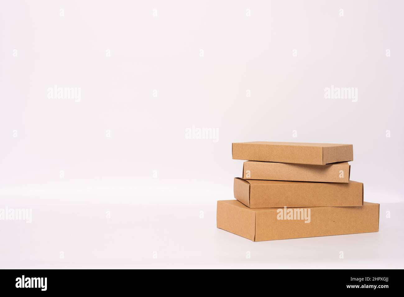 Closed craft cartoon box isolated on white background Stock Photo - Alamy