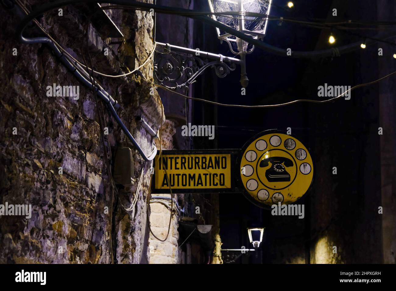 Old italian public telephone sign Stock Photo - Alamy