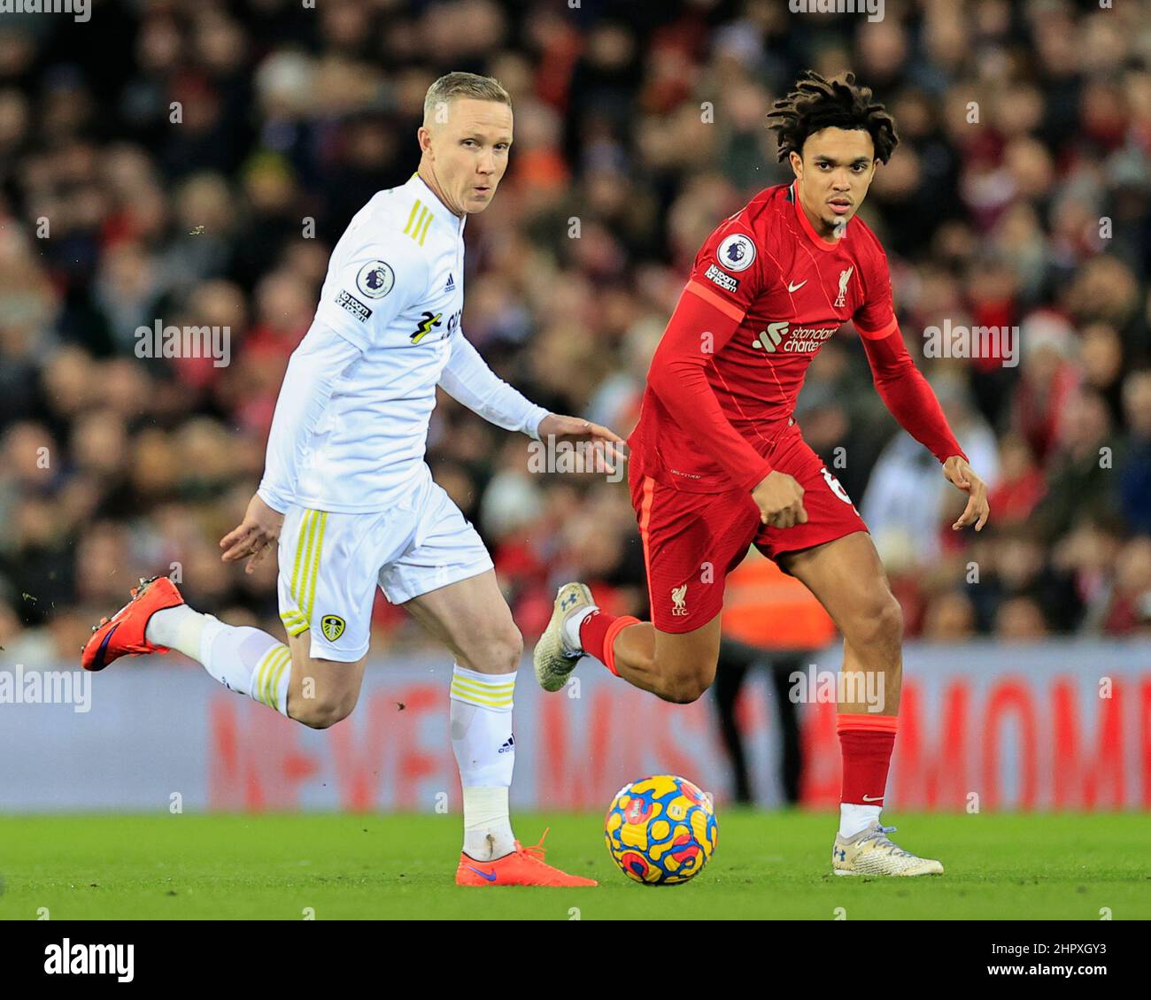 Adam Forshaw #4 of Leeds United is watched by Trent Alexander-Arnold ...