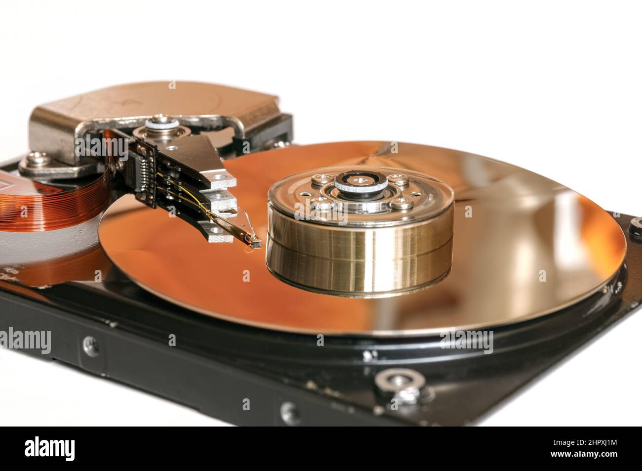Disassembled hard disk drive close-up isolated on white background ...