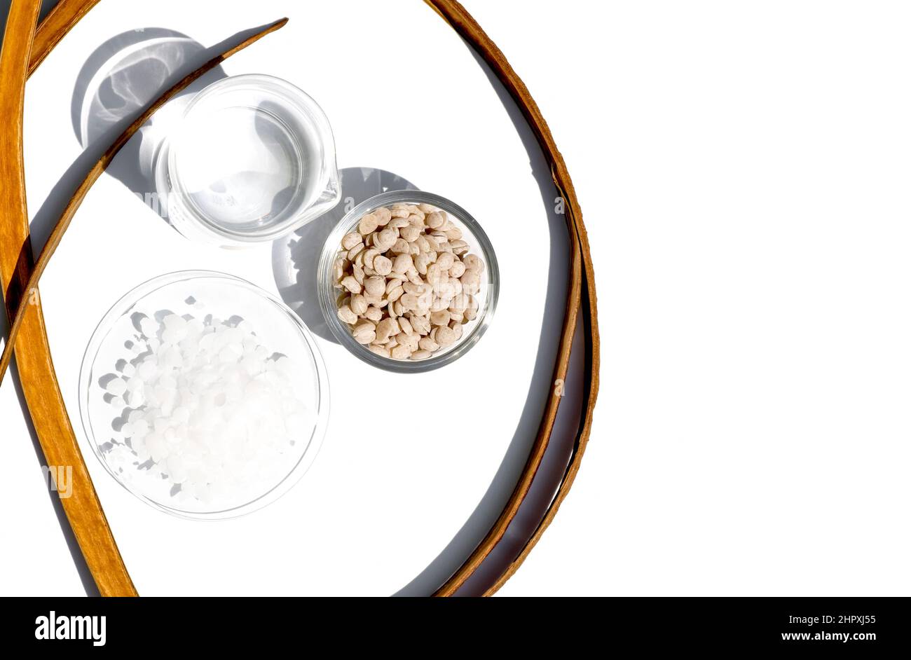 Sumac Wax in glass container and Cetyl esters wax in chemical watch ...