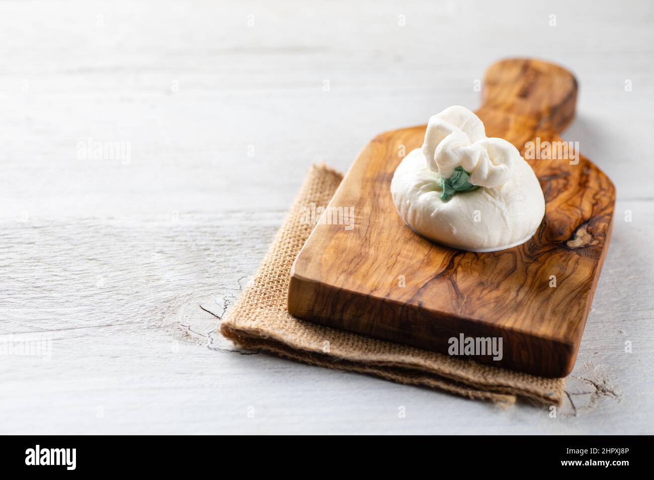 Italian burrata cheese made from mozzarella with cream inside from ...