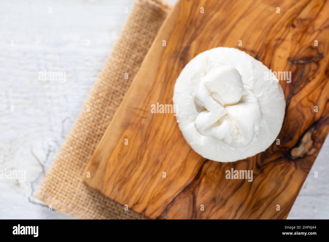 Italian burrata cheese made from mozzarella with cream inside from ...