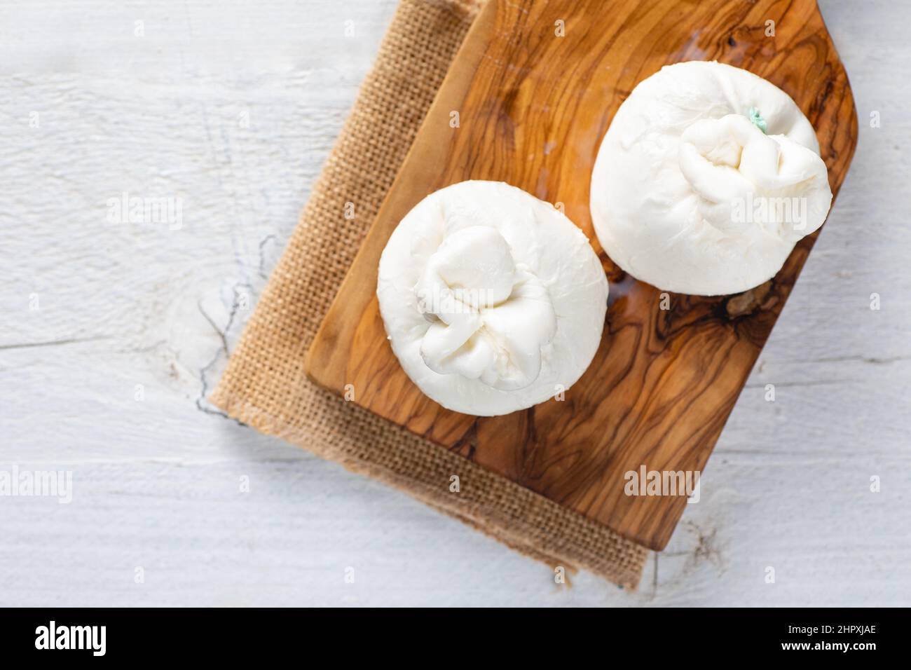Italian burrata cheese made from mozzarella with cream inside from ...