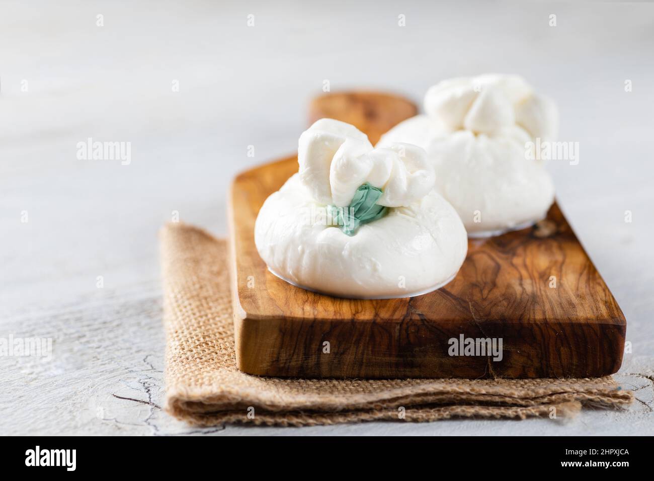 Italian burrata cheese made from mozzarella with cream inside from ...
