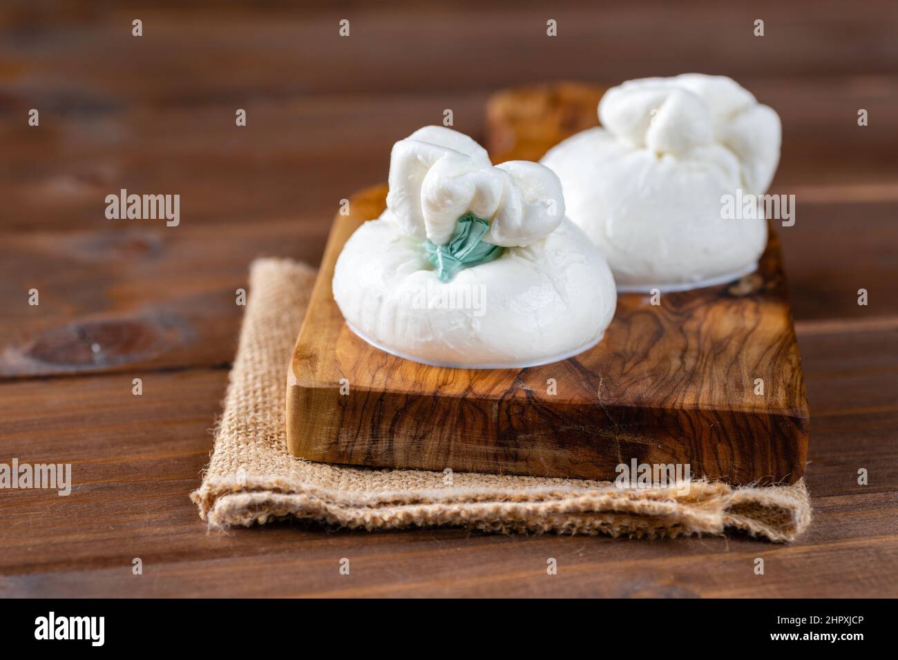 Italian burrata cheese made from mozzarella with cream inside from ...