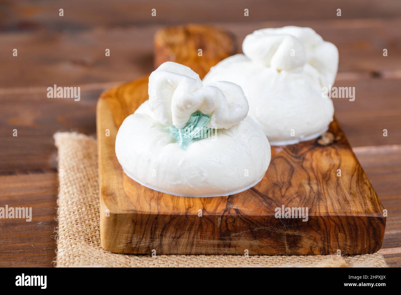 Italian burrata cheese made from mozzarella with cream inside from ...