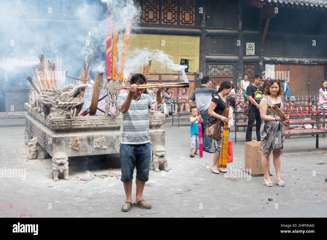 SICHUAN, CHINA - Pilgrim at Lingshan Temple. a famous Temple in ...