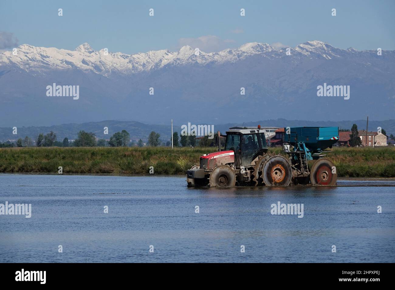 Ricefield tractor hi-res stock photography and images - Alamy