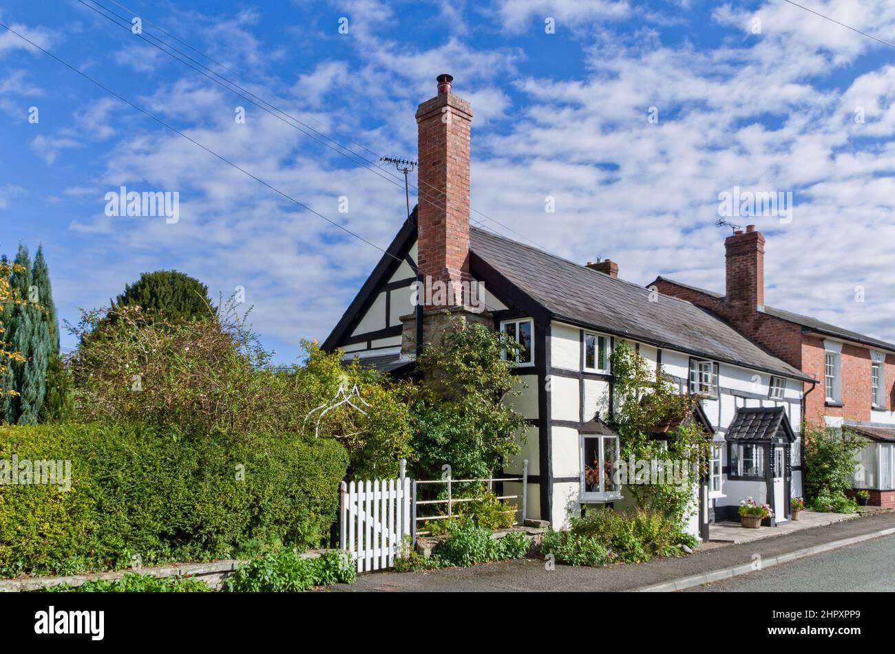 Black and white half timbered cottage in the village of Dilwyn ...