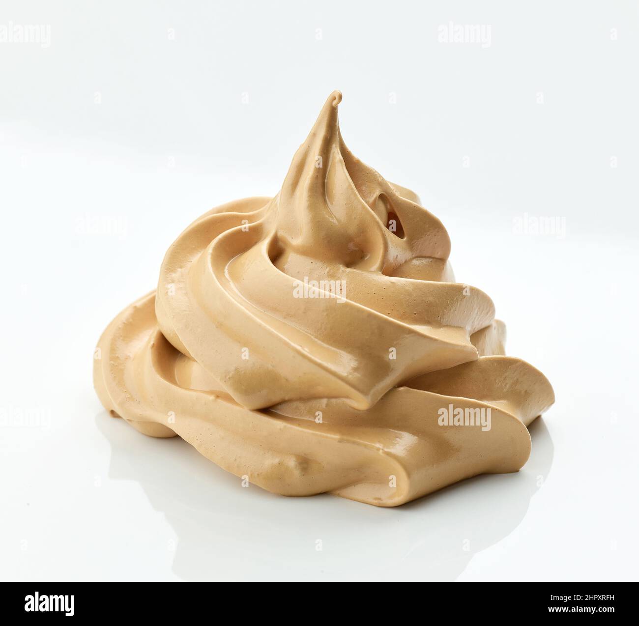 whipped caramel and coffee mousse cream swirl on white background Stock ...