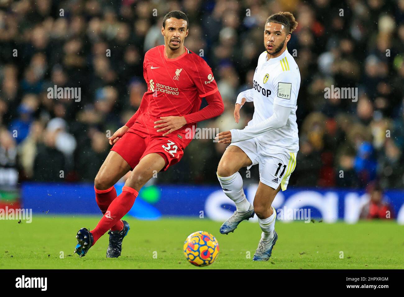 Liverpool, UK. 23rd Feb, 2022. Joel Matip #32 of Liverpool is tracked ...