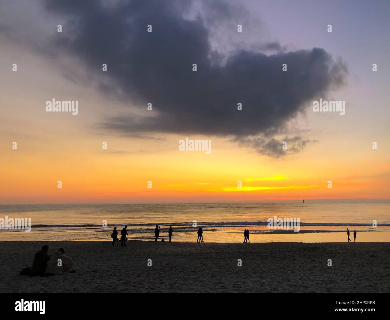 people enjoy the scenic sunset at List at sland Sylt in Germany Stock ...
