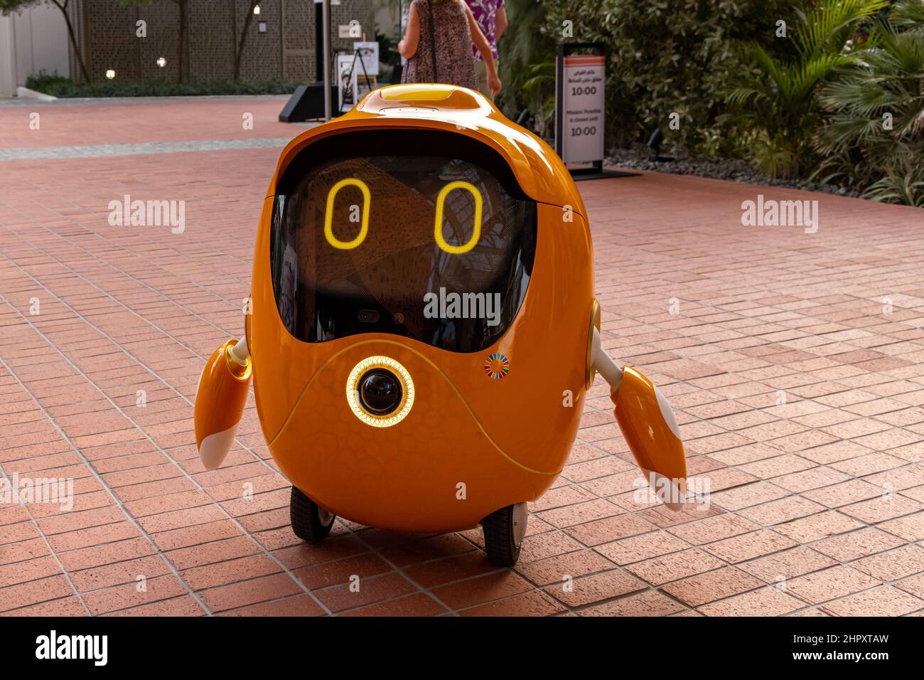 Talking yellow robot Opti in the Opportunity District of the Dubai Expo ...
