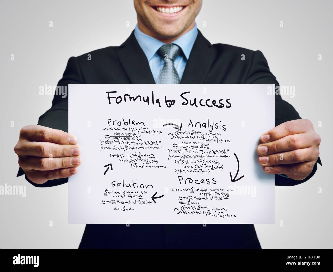 My method of success. Cropped shot of a businessman holding up a flow ...