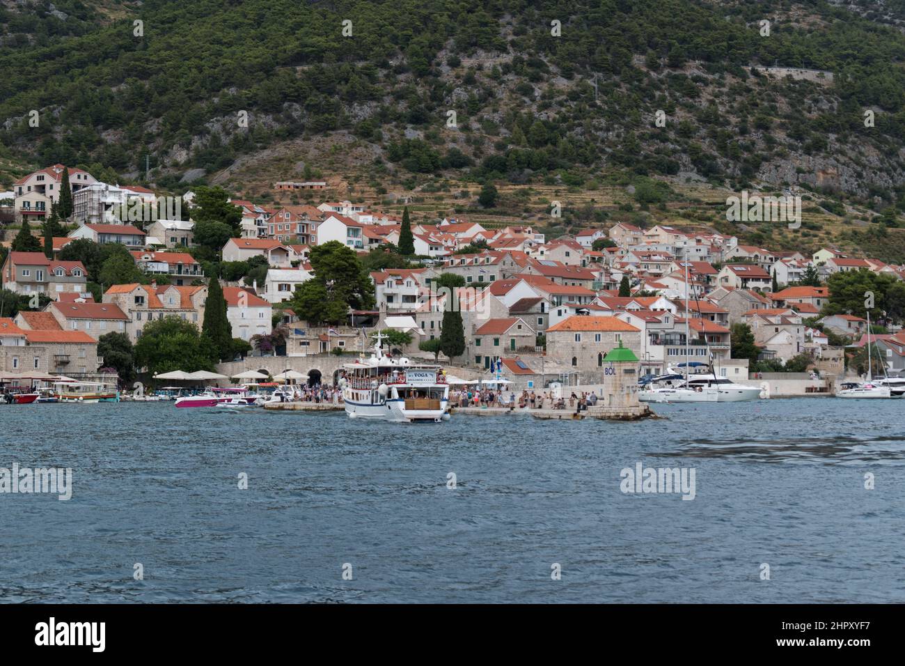 The town of Bol on the island of Brac in Croatia during the summer ...