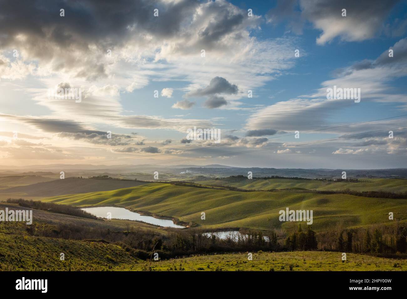 Tuscan landscape: a dreamlike country of wide verdant hills dotted with ...