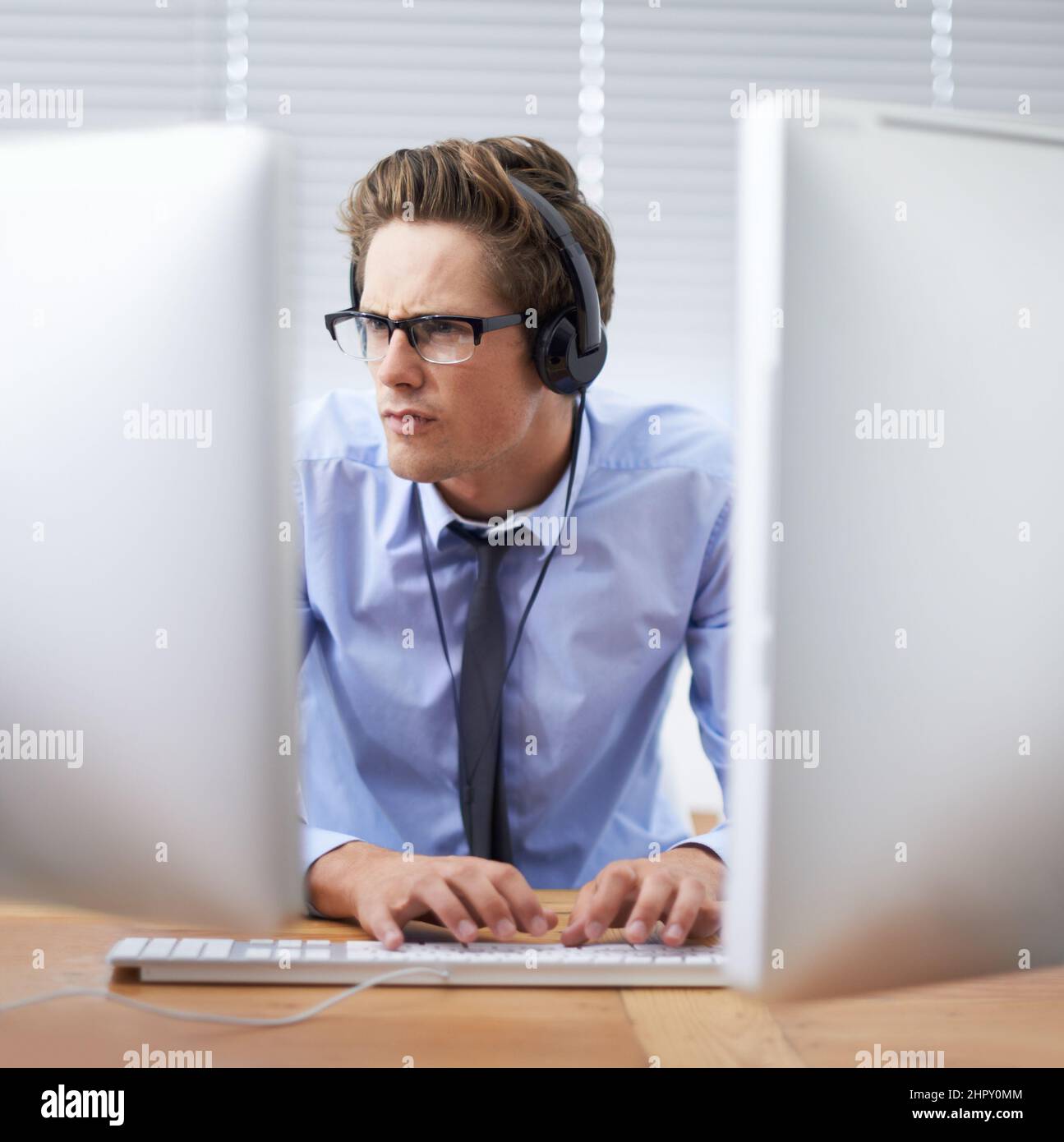 Person working computer screens hi-res stock photography and images - Alamy